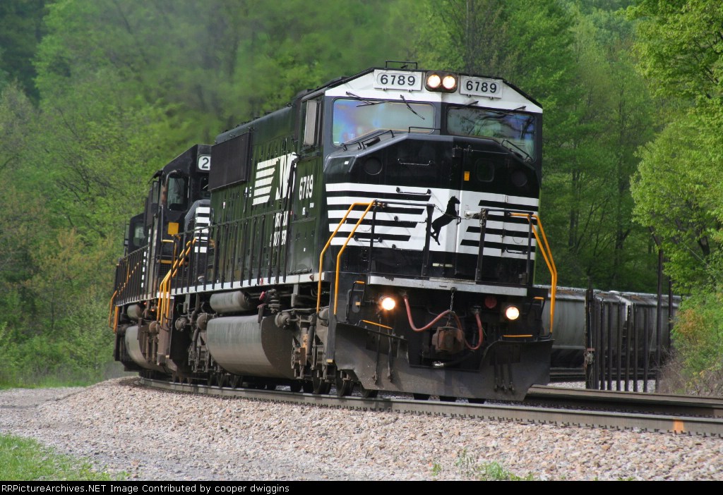 194 digging in uphill with a nice EMD trio